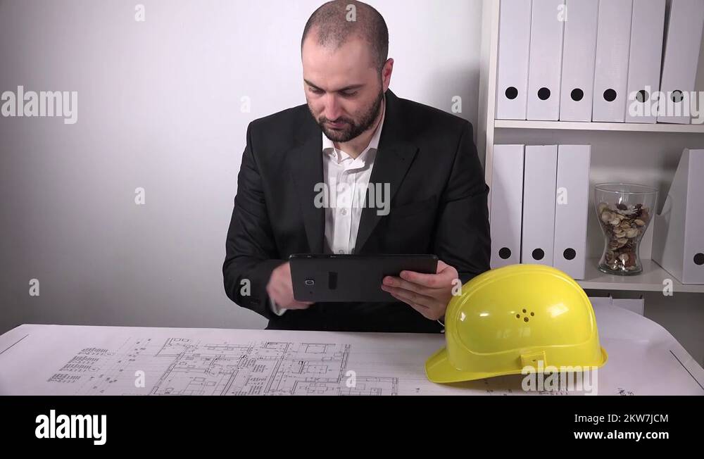 Construction engineer architect man work tablet read blueprints client ...