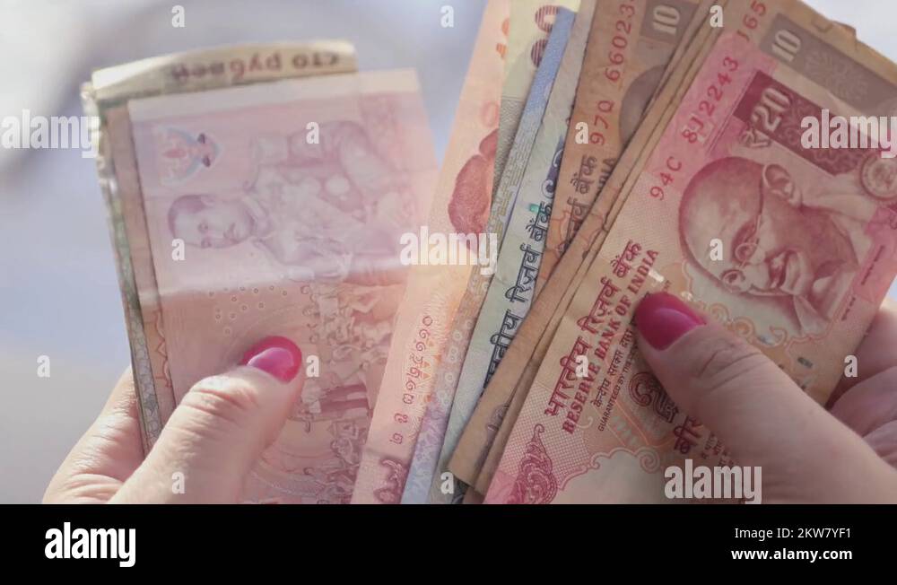 old worn around the money in the hands of a girl. 4k, 3840x2160 Stock ...