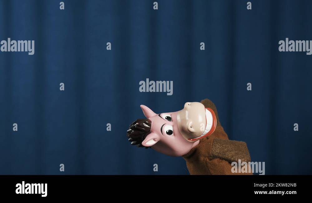 Horse hand puppet makes vivid scene exit and run away with blue ...