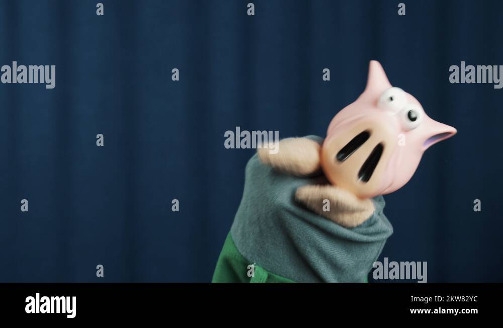Pig hand puppet make cash toss gesture and disappear off scene blue ...
