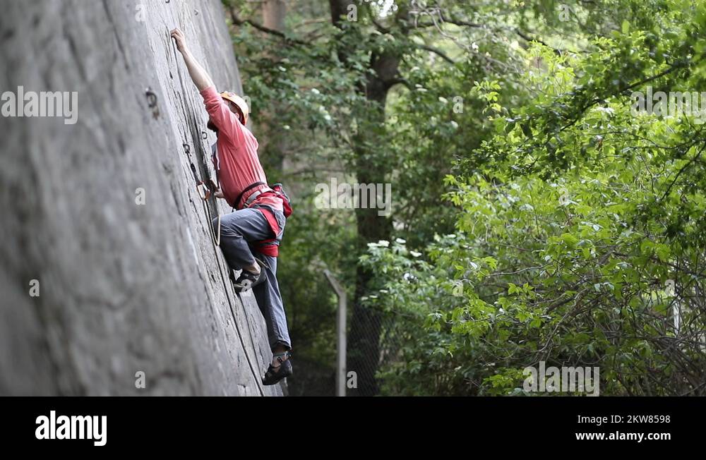 Rock climber holding on by one hand Stock Videos & Footage - HD and 4K ...