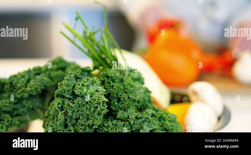 Woman chopping vegetables in kitchen Stock Videos & Footage - HD and 4K ...