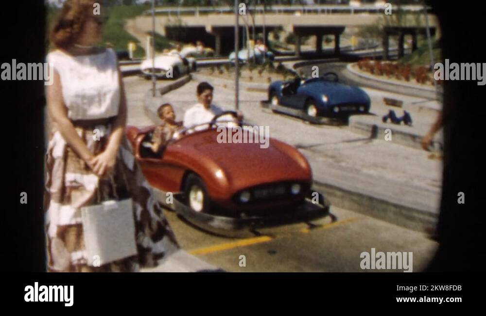 1959: mother and child driving a miniature car. DISNEYLAND Stock Video ...