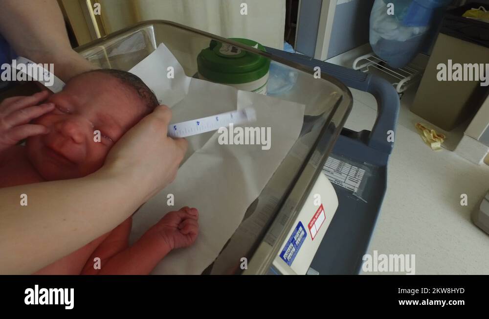Measuring infant Stock Videos & Footage - HD and 4K Video Clips - Alamy