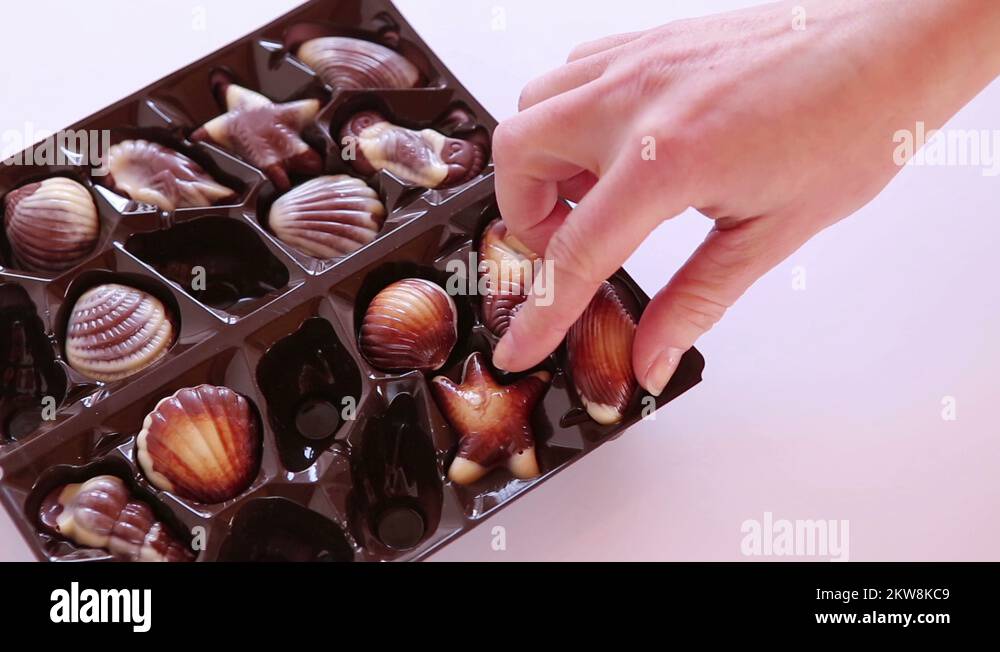Woman taking chocolate candy Stock Videos & Footage - HD and 4K Video ...