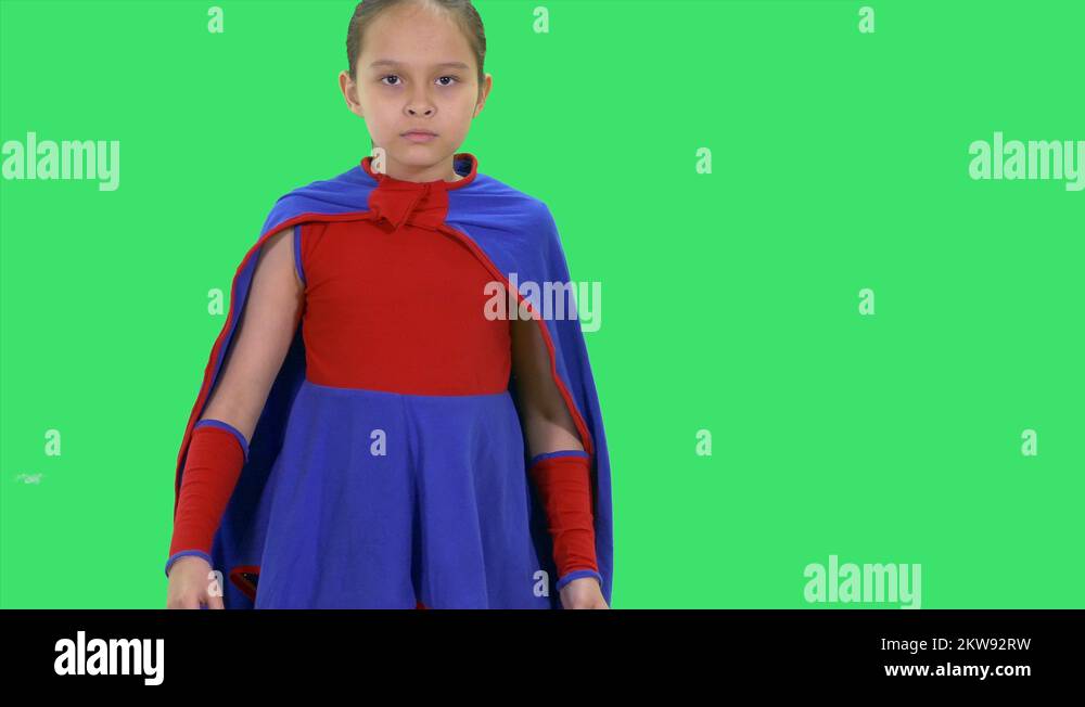 Superhero girl in fighting stance on green screen Stock Video Footage ...