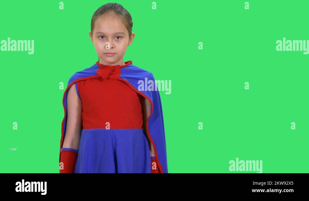 Superhero girl in fighting stance on green screen Stock Video Footage ...