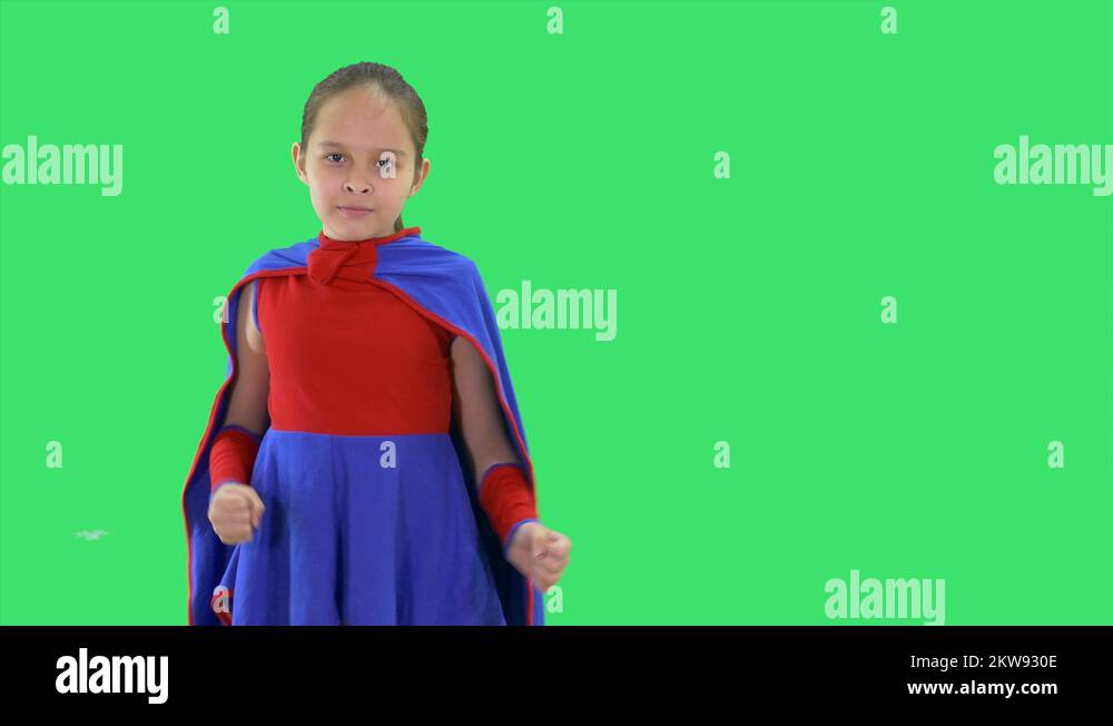 Superhero girl in fighting stance on green screen Stock Video Footage ...