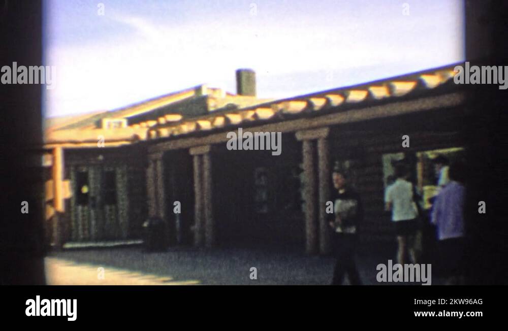 1959: people relaxing in the garden outside a small and pretty shopping ...