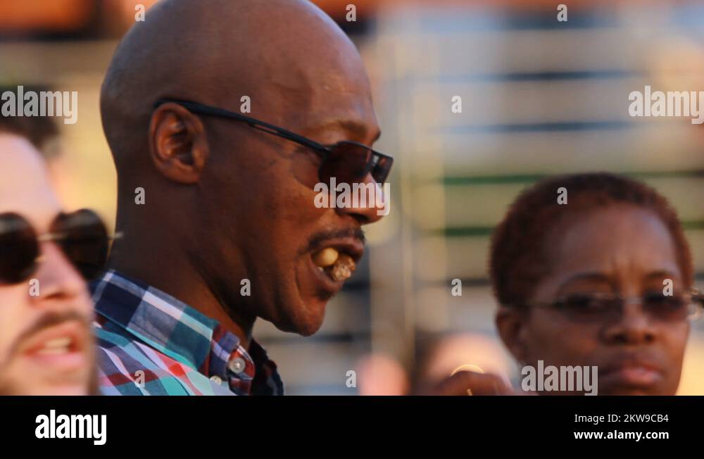 Young crowd of african american dancing at an open-air music festival ...