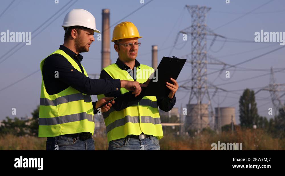 Team of Inspector Engineer Men Report Browsing Note Dates Examine ...