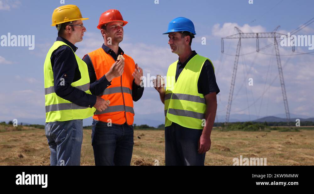 Team of Electricians Engineers Men Talking Eat Breakfast Walking ...