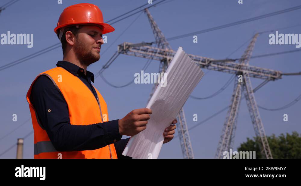 Engineer Man Analyze Expansion Plans Examining Industrial Area ...