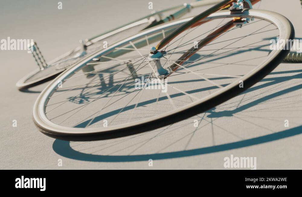 Retro bicycle lying on concrete road. Spinning wheel. Loop animation ...