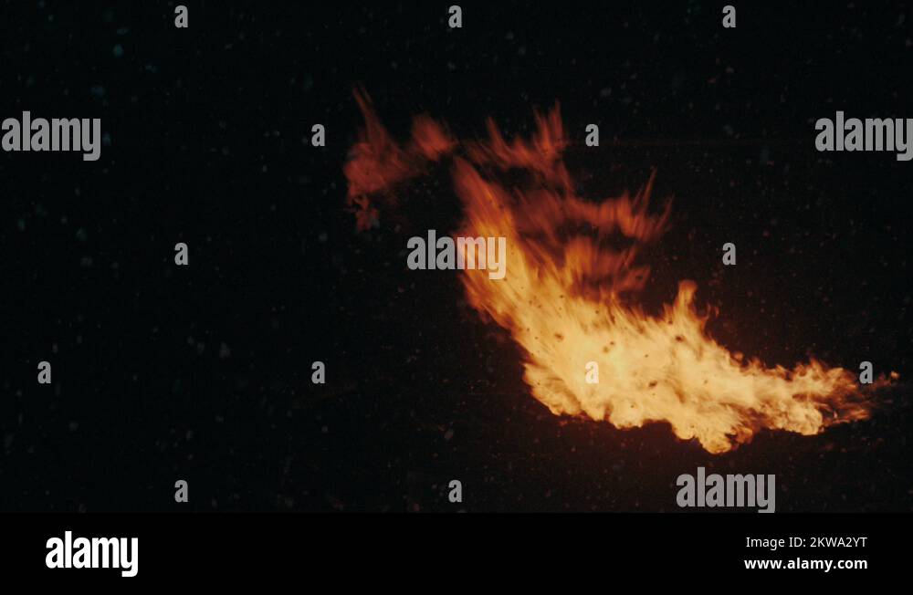 Flame fire blow on dark background. Blowing fire flame on night ...