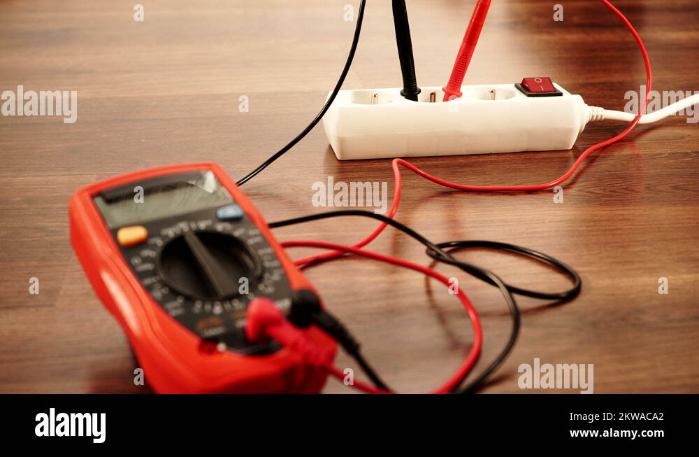 Measurement voltage in electrical socket with multimeter 4K Stock Video ...