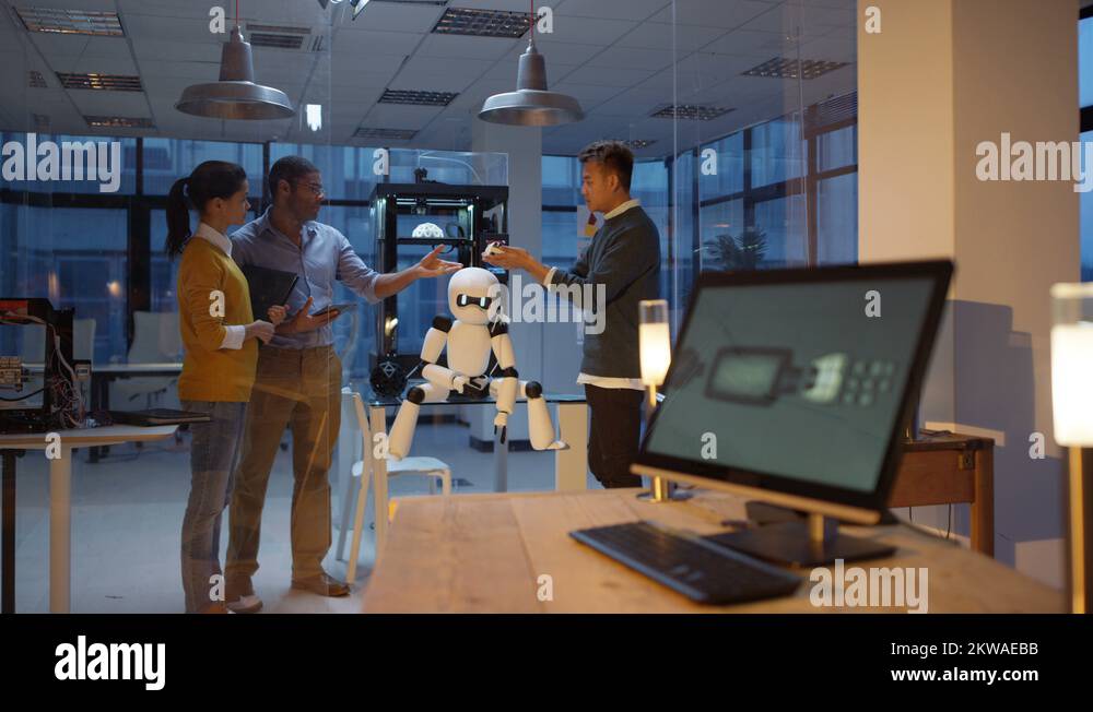 4K Electronics engineering team using 3D printed components to create a robot Stock Video ...