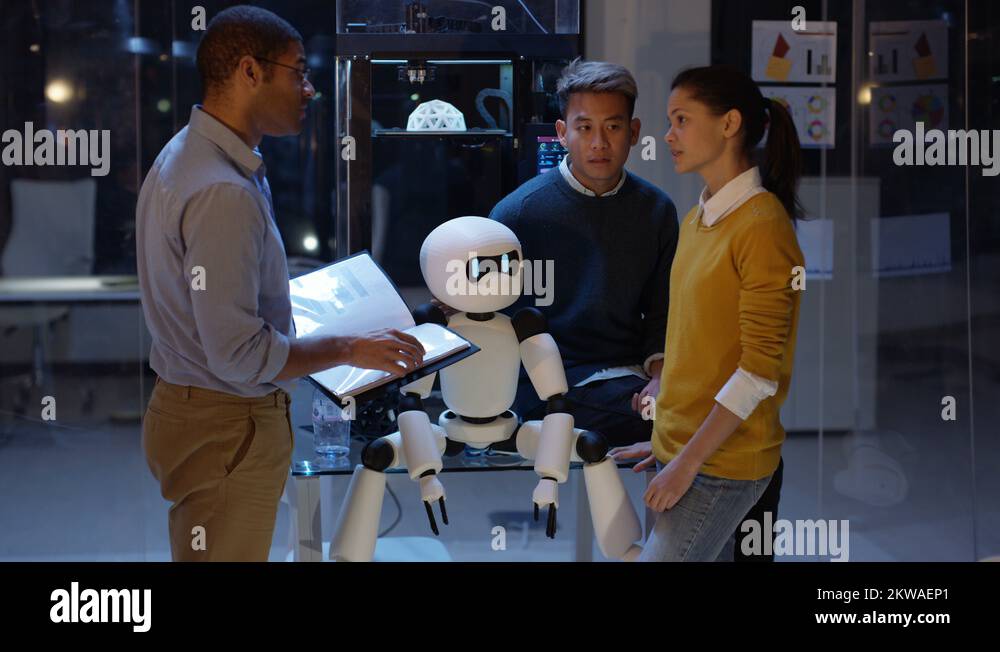 4K Electronics engineering team building robot with 3D printed components Stock Video Footage ...