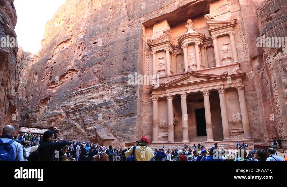 People near Al Khazneh or the Treasury at ancient Rose City of Petra in ...