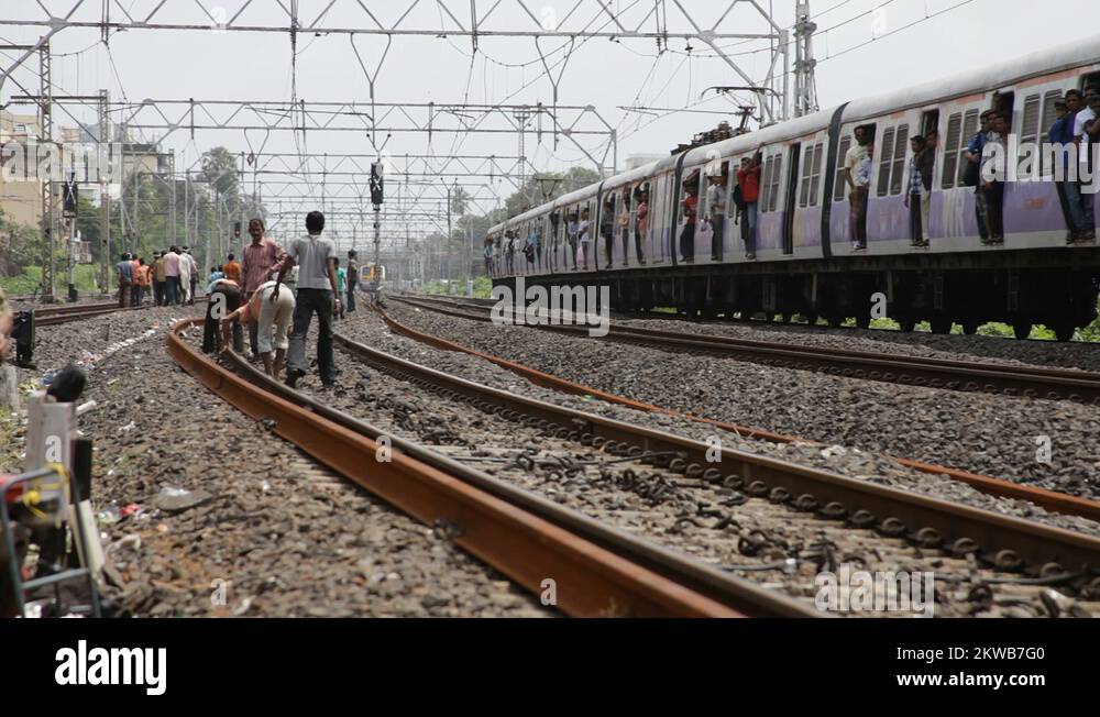 Repair and maintenance work going on on western railway local trains ...