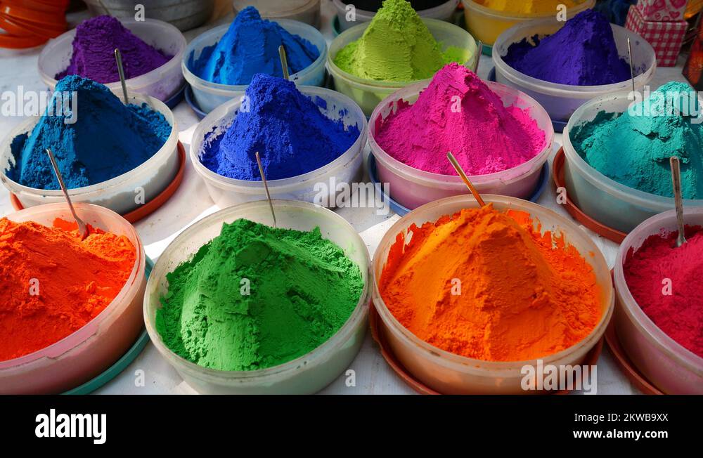 Bowls vibrant coloured dyes and Rangoli mixed with colours for Diwali ...