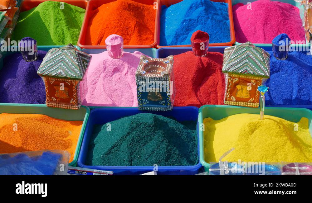 Bowls vibrant coloured dyes and Rangoli mixed with colours for Diwali ...