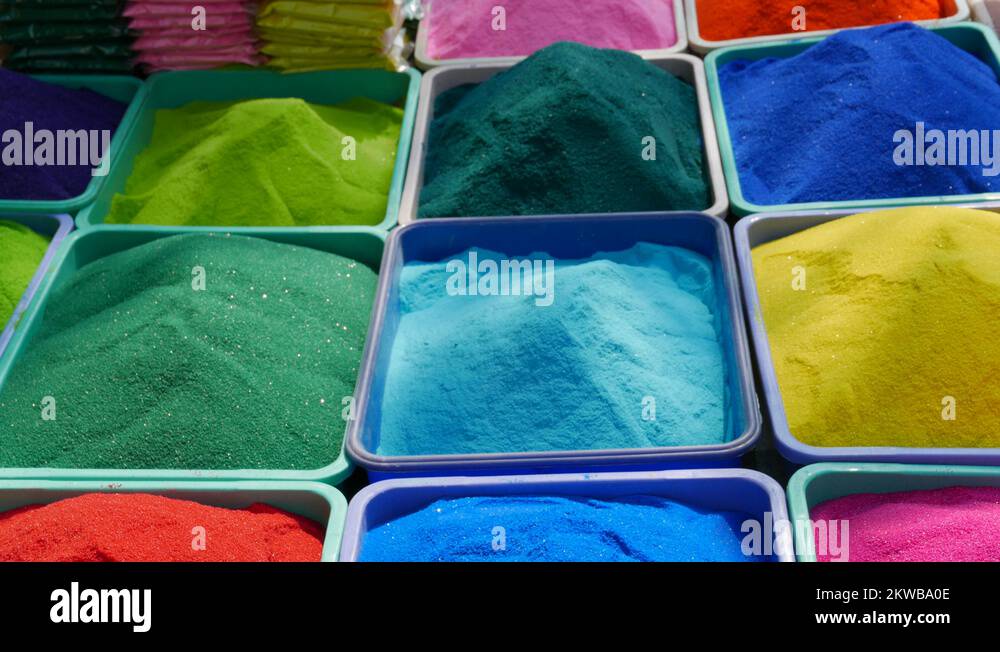 Bowls vibrant coloured dyes and Rangoli mixed with colours for Diwali ...