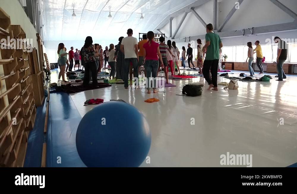 Active people makes dancing moves in group classes in gym Stock Video ...