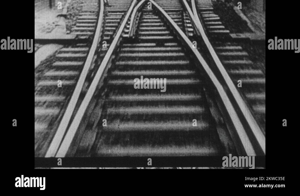 1940s: Trains travel down a railroad track in Germany while Adolf ...