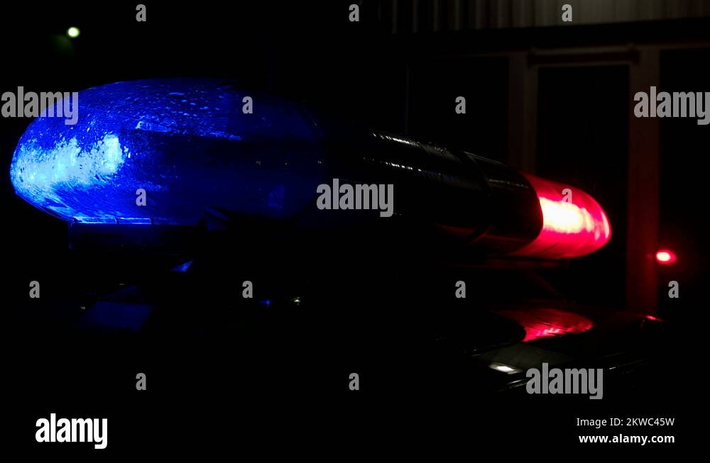 Police lights flashing at night downtown at crime scene, close up Stock ...