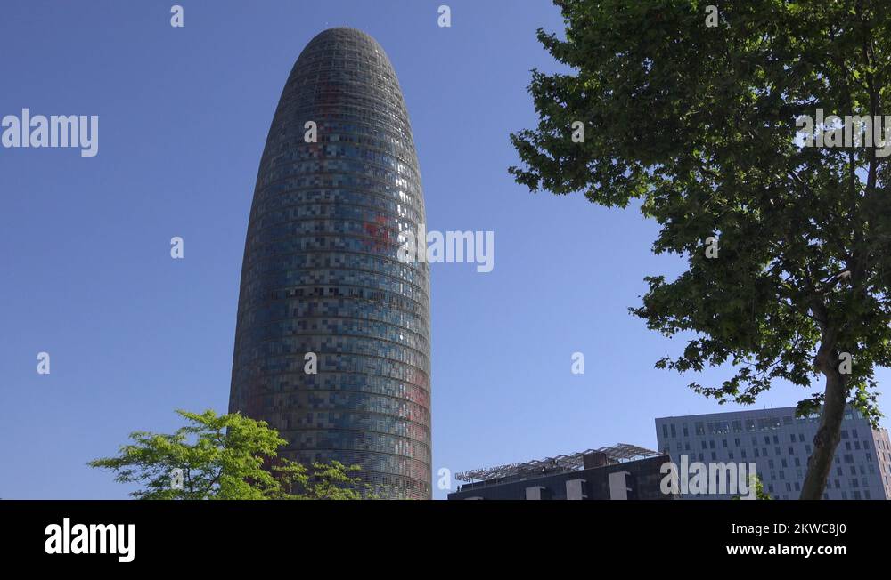 Summer day in Barcelona city Agbar tower skyscraper tallest building in ...