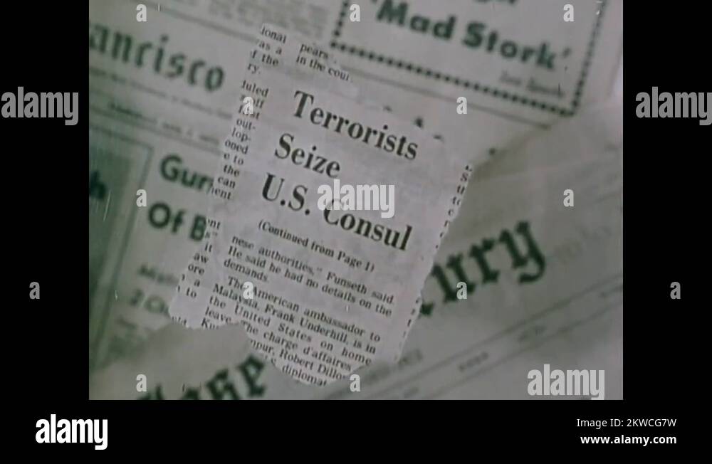 Newspaper clippings about terrorists and the ambushing of a car are ...