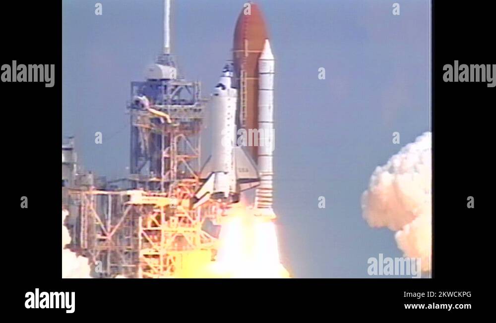 1990s: A rocket with a space shuttle attached takes off. A space ...