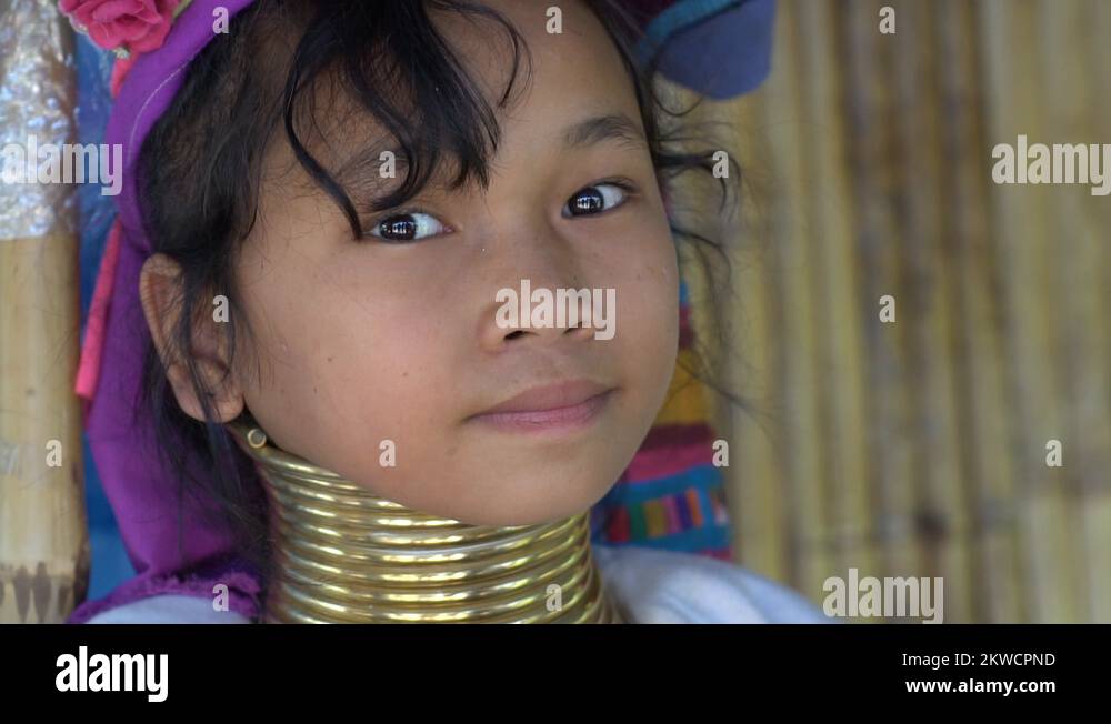 Long Neck girl in traditional costumes from Myanmar Stock Video Footage ...