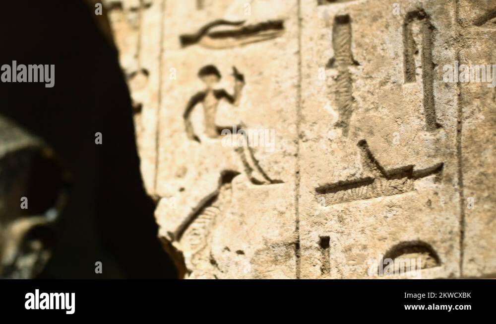 Ancient Egyptian Hieroglyphics Carved into Stone Wall Stock Video ...