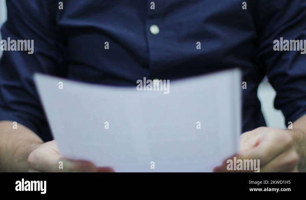 Man ripping paper Stock Videos & Footage - HD and 4K Video Clips - Alamy