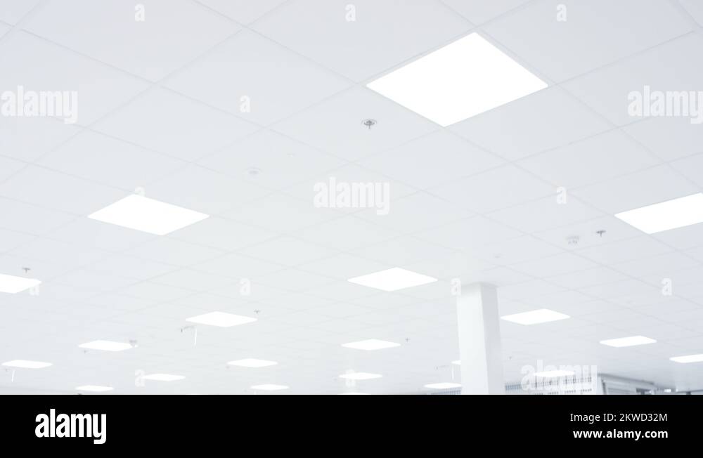 4K Empty interior of large modern data centre with rows of server racks ...