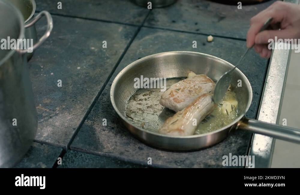 Cook in the restaurant fry meat and Vegetables 4k Stock Video Footage ...