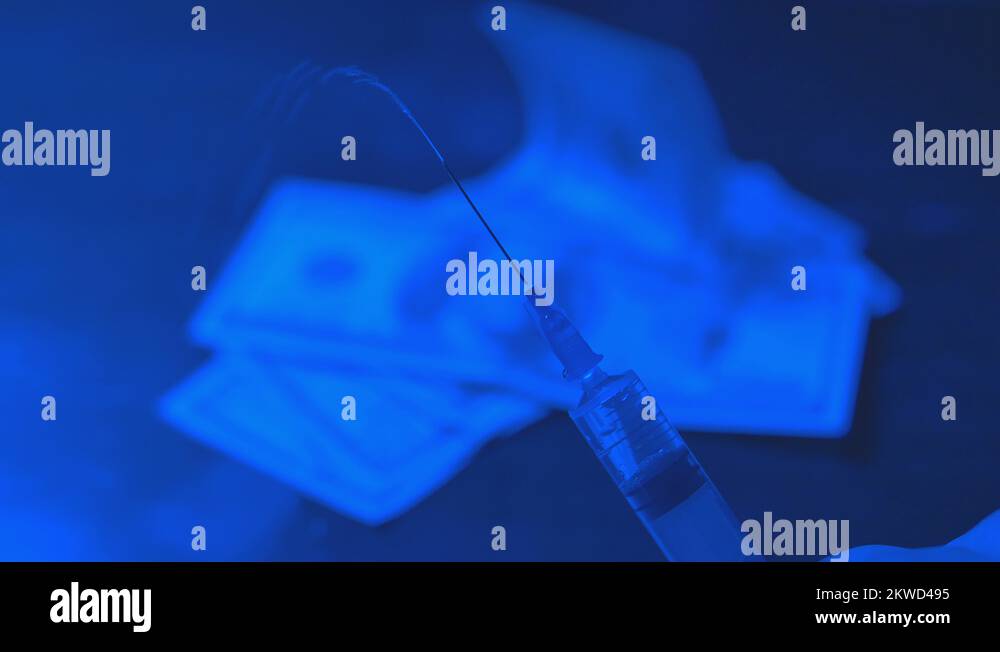 Men collect and release the air out of the syringe and inject it. Money ...