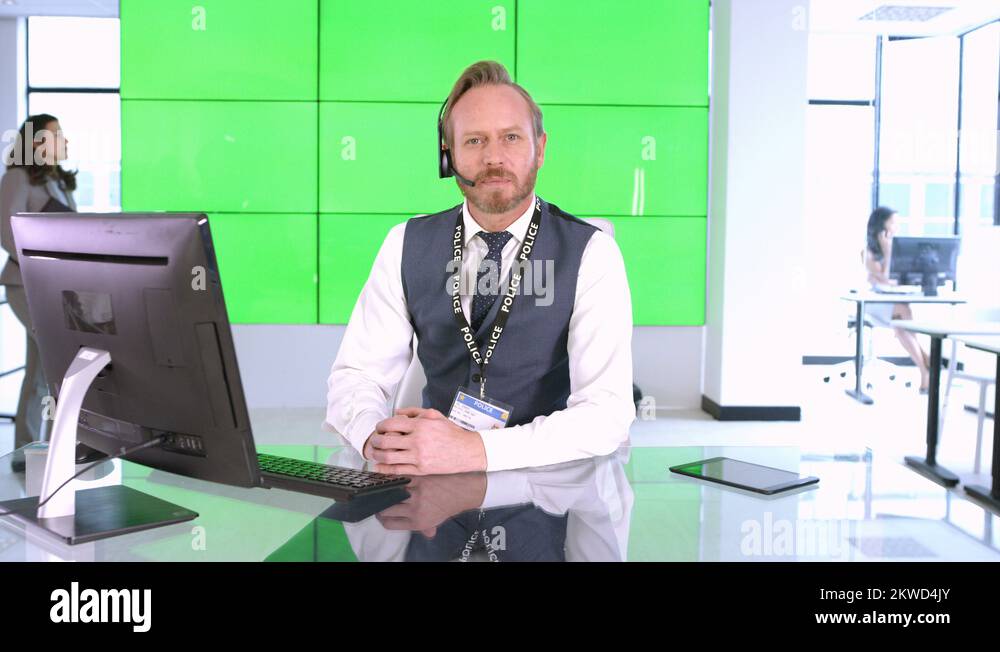 4K Phone operator with police service assisting a caller, with green ...