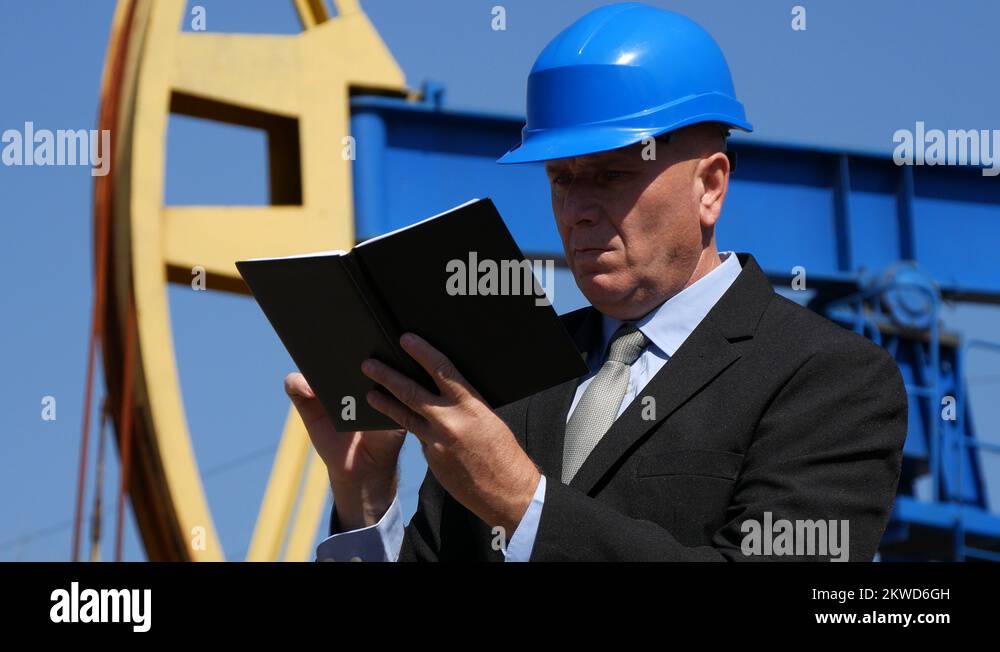 Oil Extracting Company Active Businessman Work Calculating and Note in ...