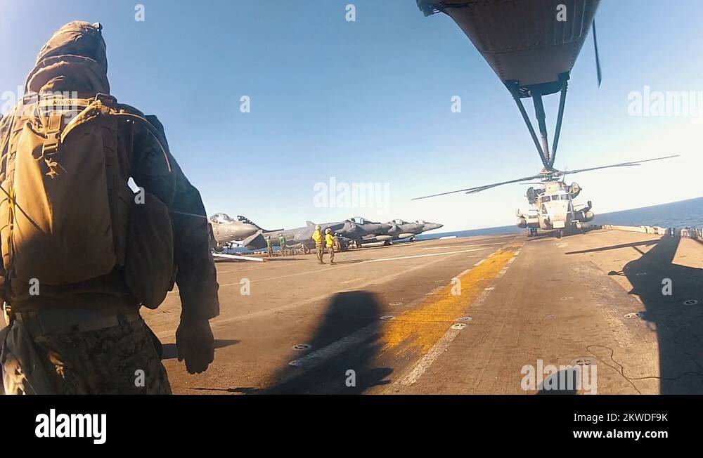 Troops boarding military aircraft on Navy Battleship For Combat Stock ...