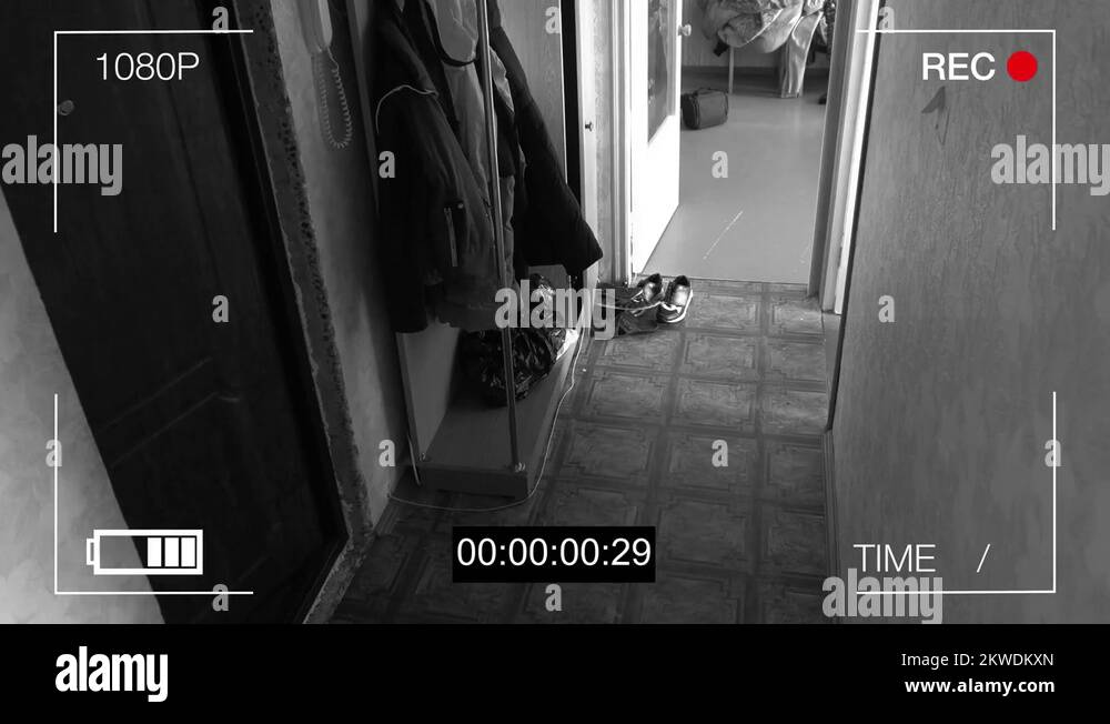 CCTV camera caught thief with a crowbar broke into the apartment Stock ...