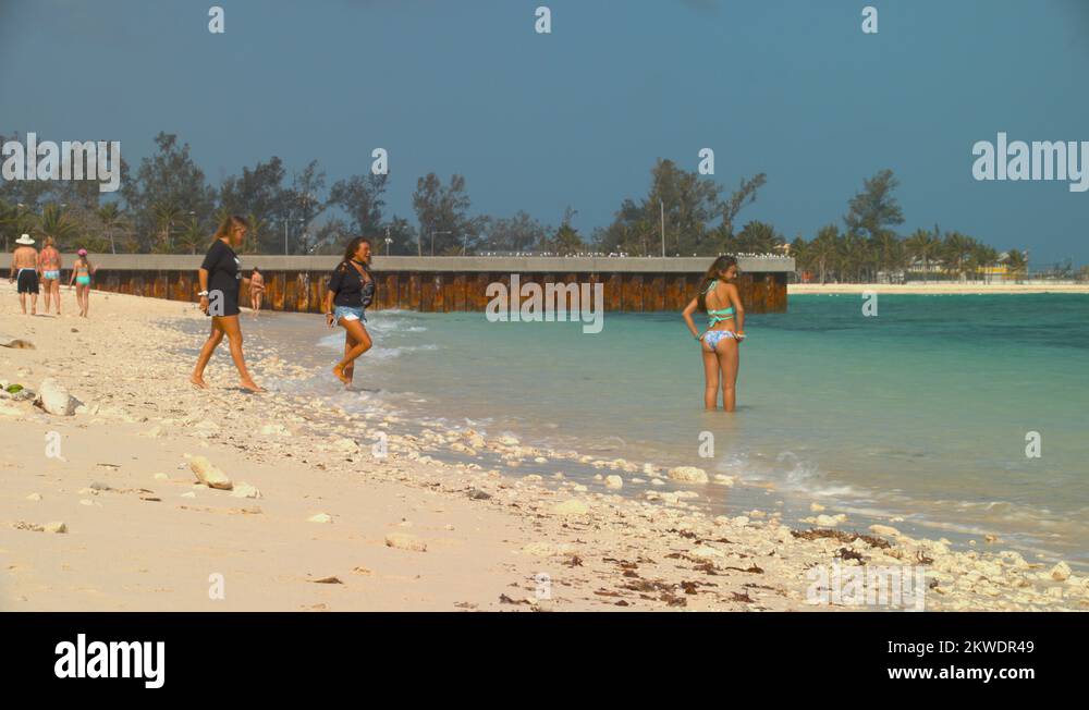 Nassau Bahamas Pretty Girls on Junkanoo Beach Stock Video Footage - Alamy