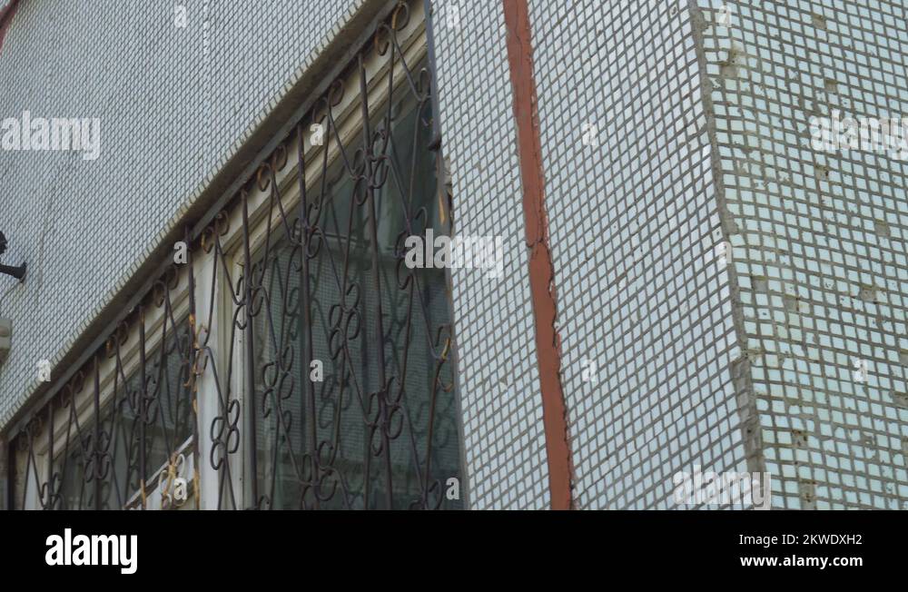 CCTV camera located on the wall of the school building Stock Video ...