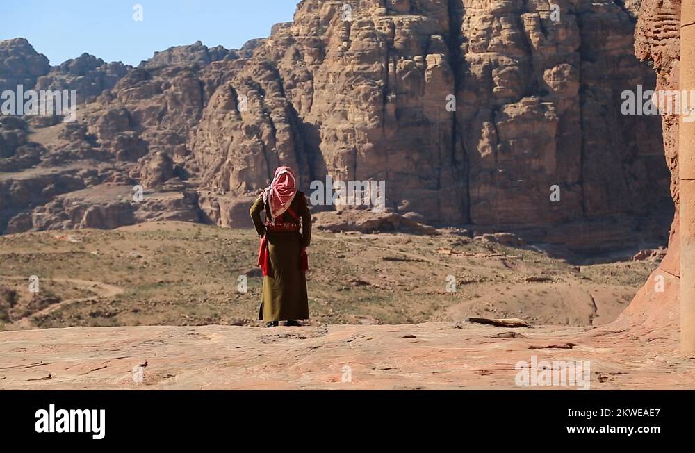 Jordanian in traditional clothes in ancient Petra, Jordan Stock Video ...