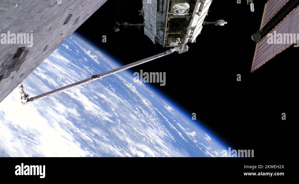 Astronaut Spacewalk on Robotic Arm From Shuttle Working on ISS, 4K ...