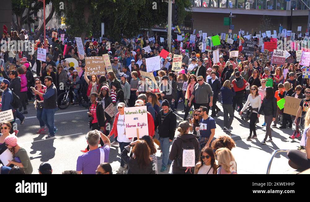 Carrying signs Stock Videos & Footage - HD and 4K Video Clips - Alamy