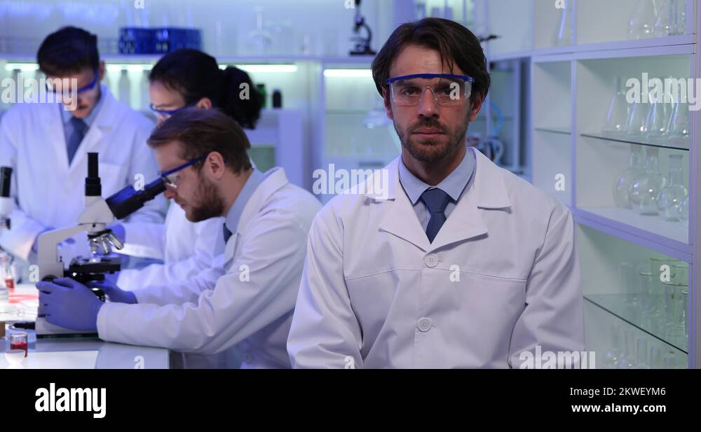 Scientist Man Look Camera Forensics Team Researchers Lab Work ...