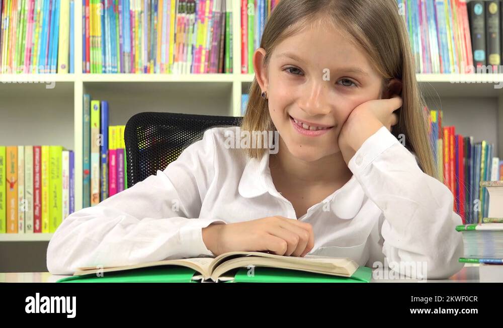Child Reading, Studying in Library, Student Girl Learning at Desk ...
